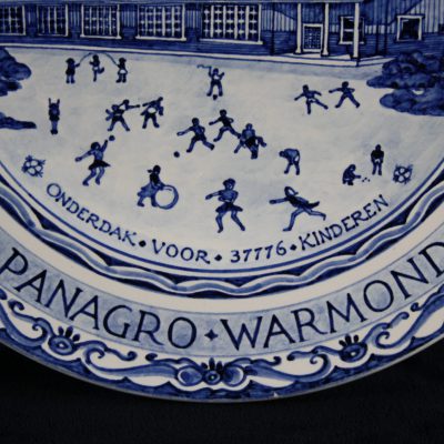 A03007 – A blue and white wall plate by Aurora Workum remembering the ...